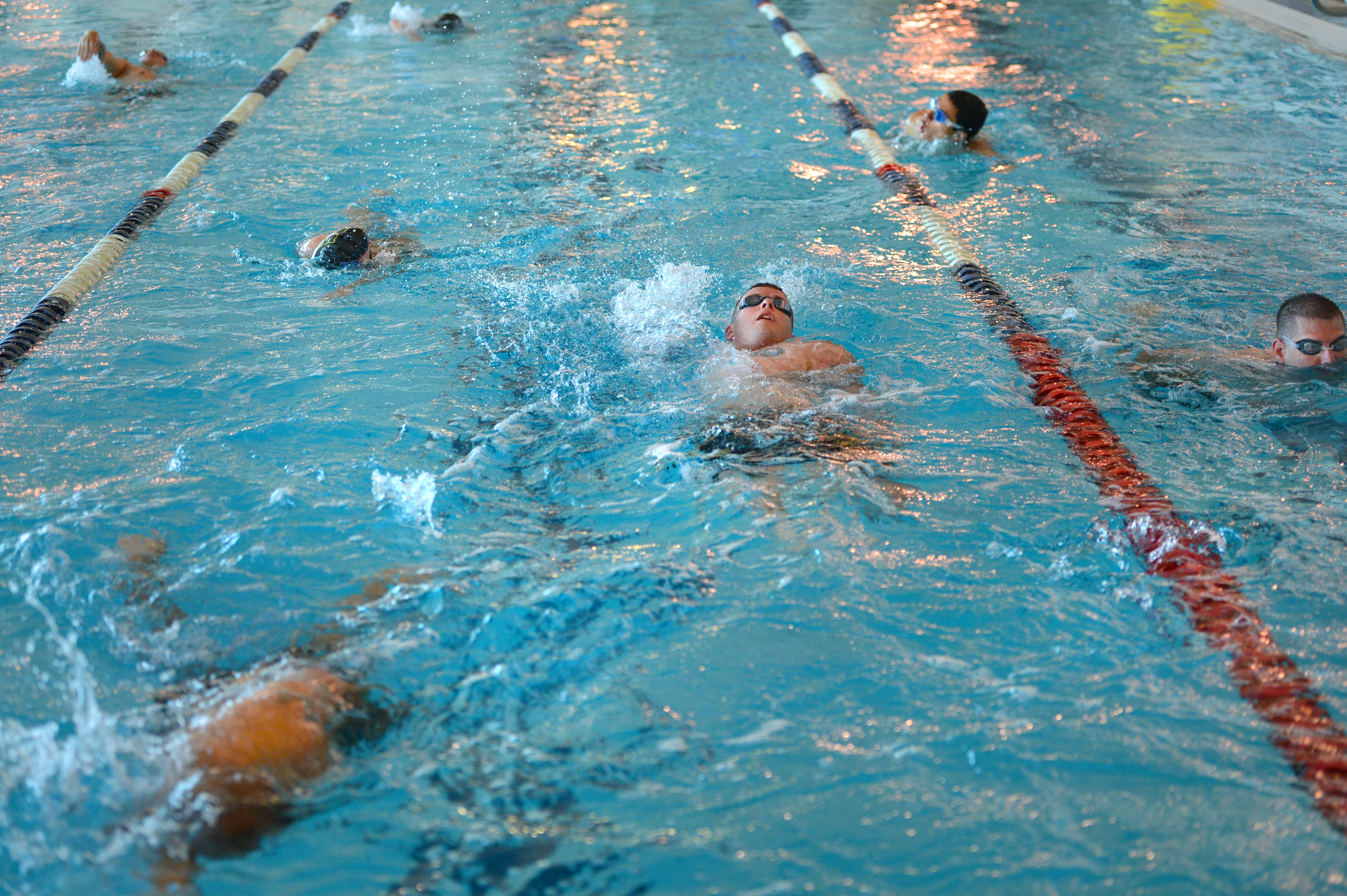 Newton's laws of motion: SWIMMING